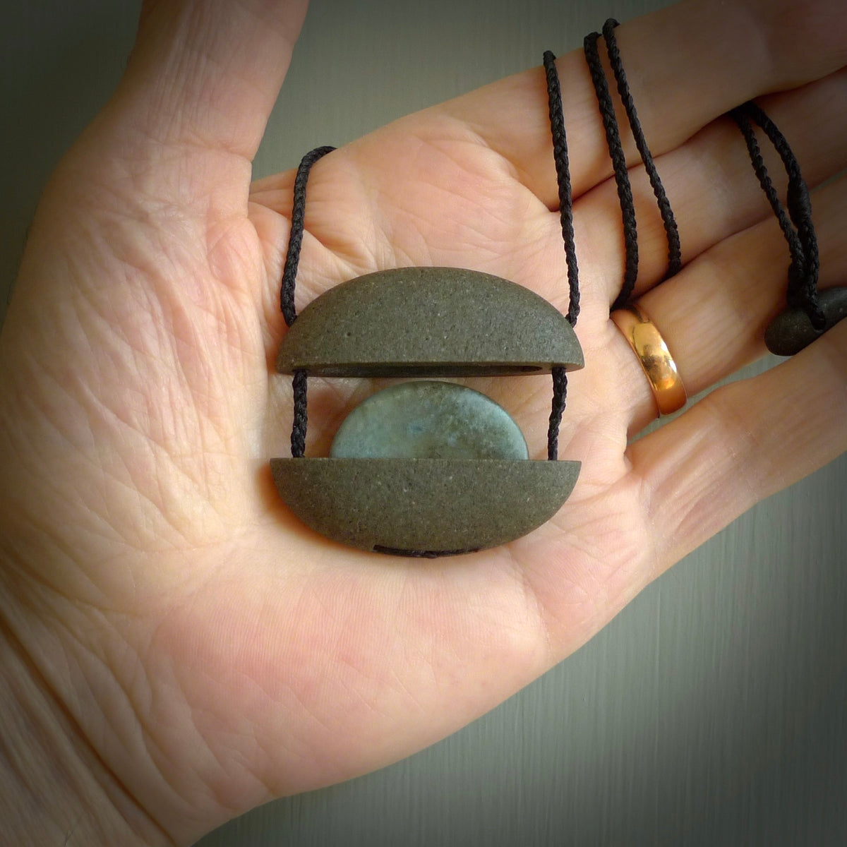 HAND CARVED NEW ZEALAND GREYWACKE STONE PENDANT WITH AOTEA INSERT – NZ ...