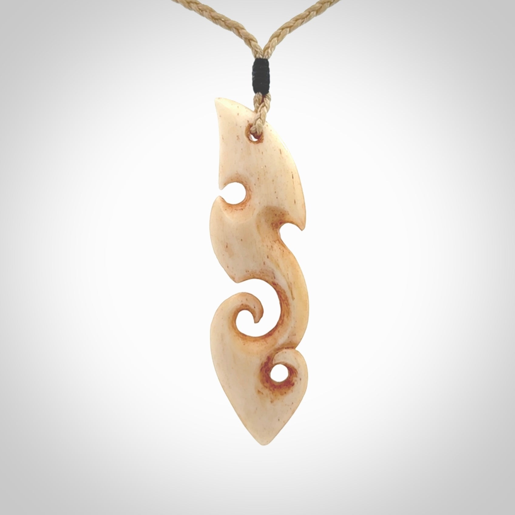 HAND CARVED STAINED BONE CONTEMPORARY KORU PENDANT. LARGE KORU PENDANT ...
