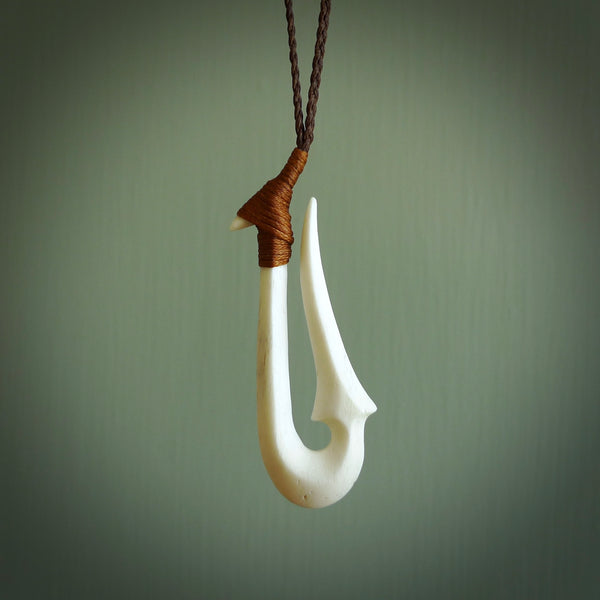 HAND CARVED BONE HOOK PENDANT. HAND MADE BONE HOOK NECKLACE. – NZ Pacific