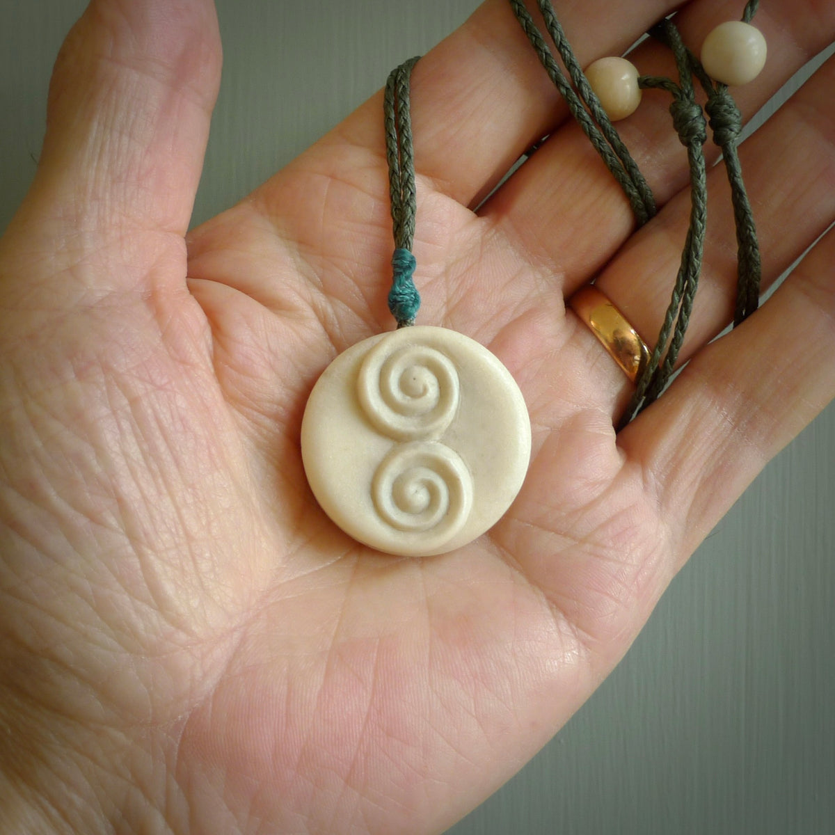 HAND CARVED NATURAL BONE KORU PENDANT - HAND MADE ENGRAVED BONE KORU ...
