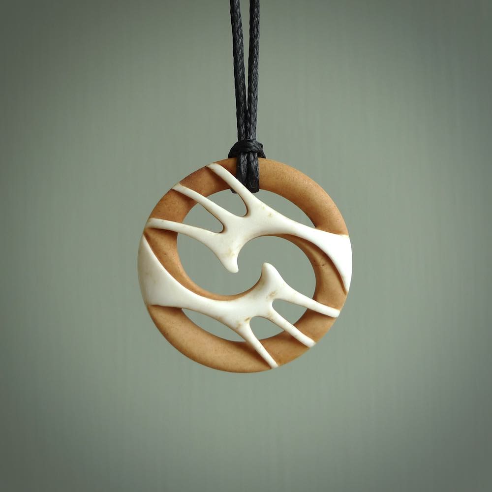 HAND CARVED NATURAL BONE CONTEMPORARY INTRICATE PENDANT. STAINED BONE ...