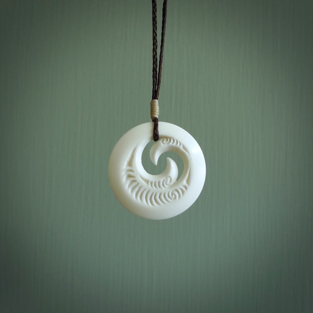 HAND CARVED NATURAL BONE KORU PENDANT - HAND MADE ENGRAVED BONE KORU ...